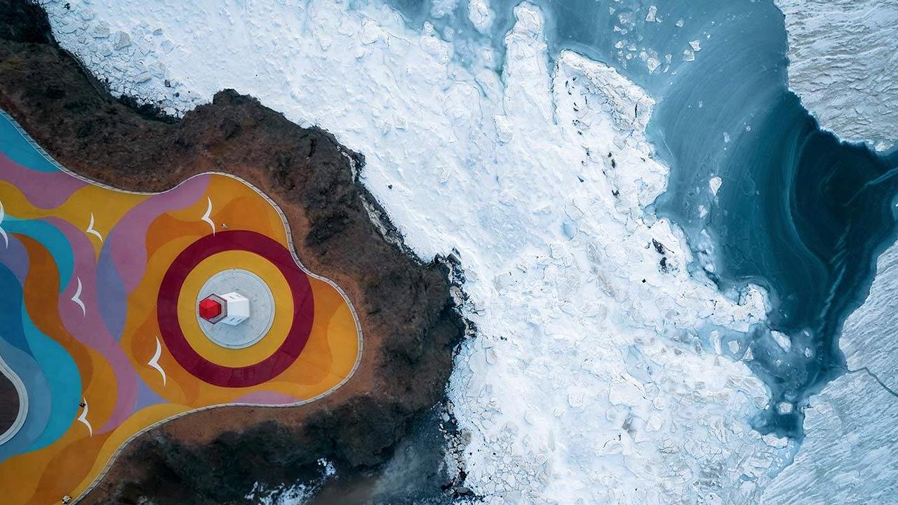 Colors and shapes, Aerial view of frozen sea and lighthouse on the ...
